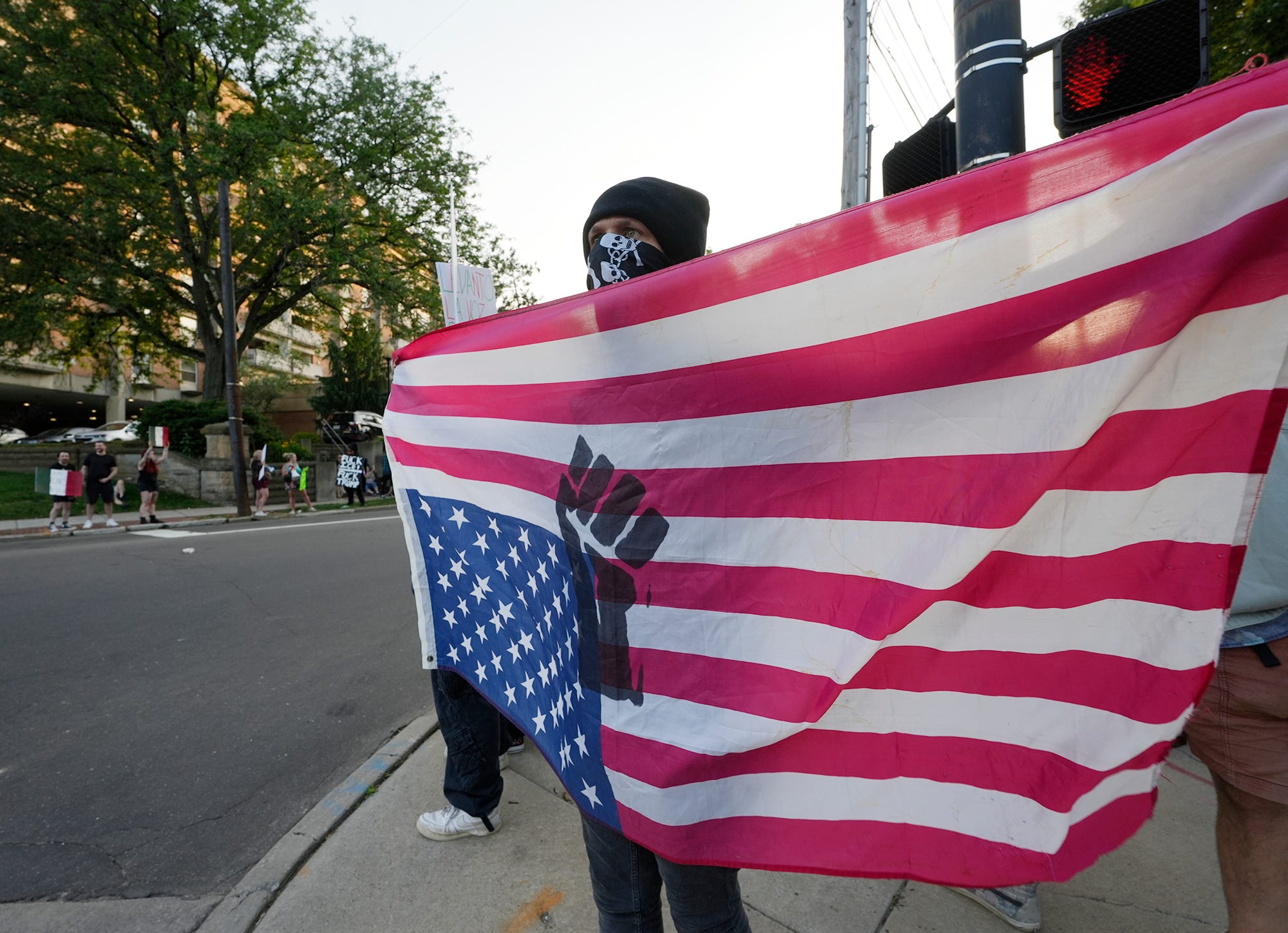 Can you wear a face mask at Good Trouble protests? What NJ law says ...