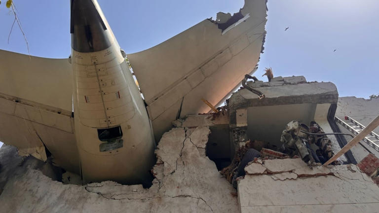 Plane tail, lunch on tables: Scenes from doctors' hostel, site of Air ...