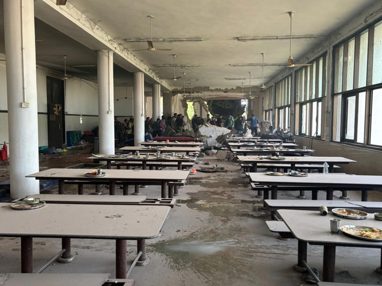 Plane tail, lunch on tables: Scenes from doctors' hostel, site of Air ...