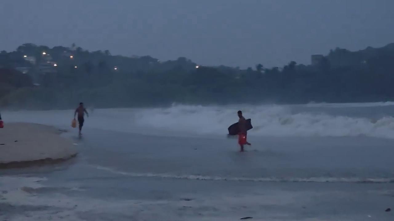 Fishermen rush to save gear from crashing waves as Hurricane Erick ...