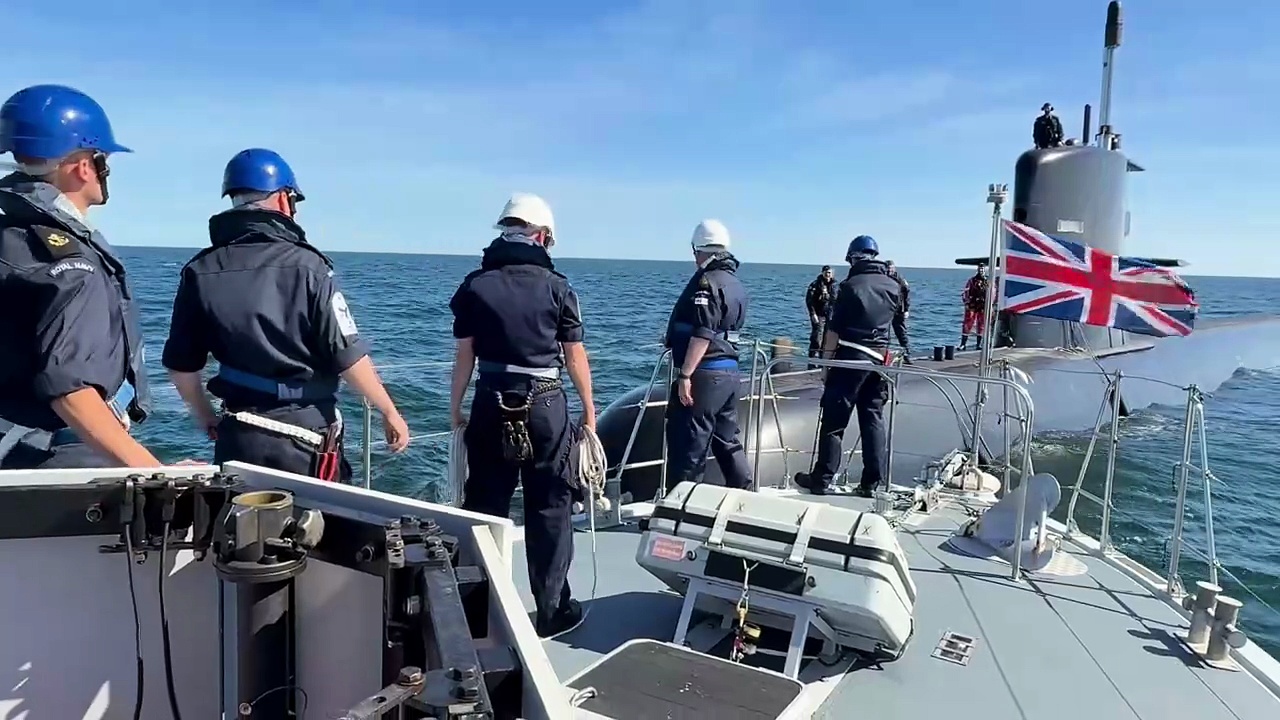 HMS Dasher rescues Swedish submariners with "emergency" caffeine boost