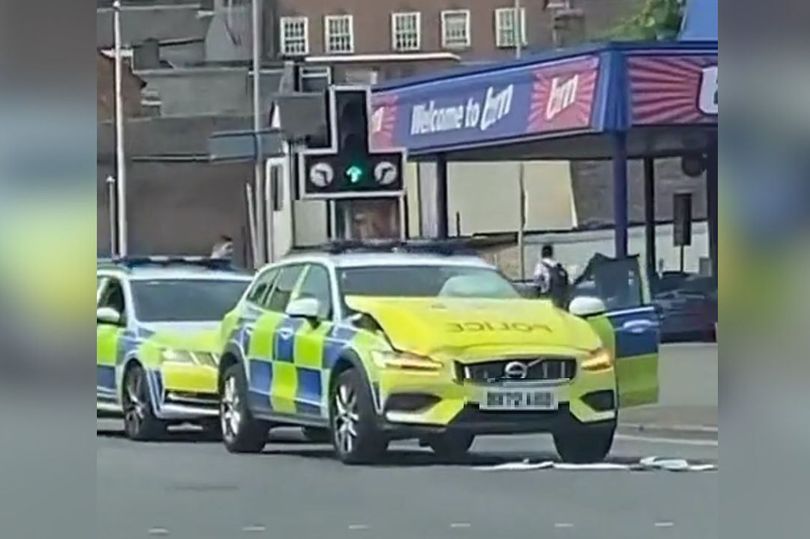 First photo of police car damaged in smash outside B&M