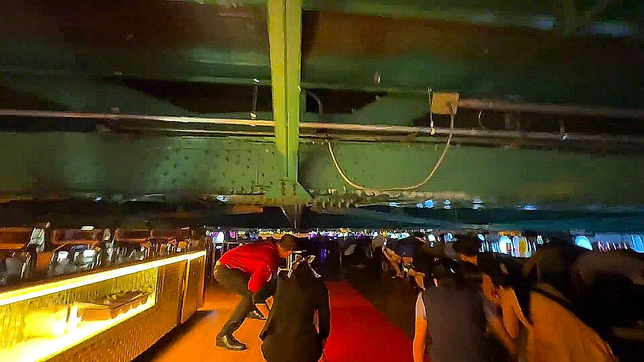 Terrifying moment passengers duck as ferry passes under low bridge
