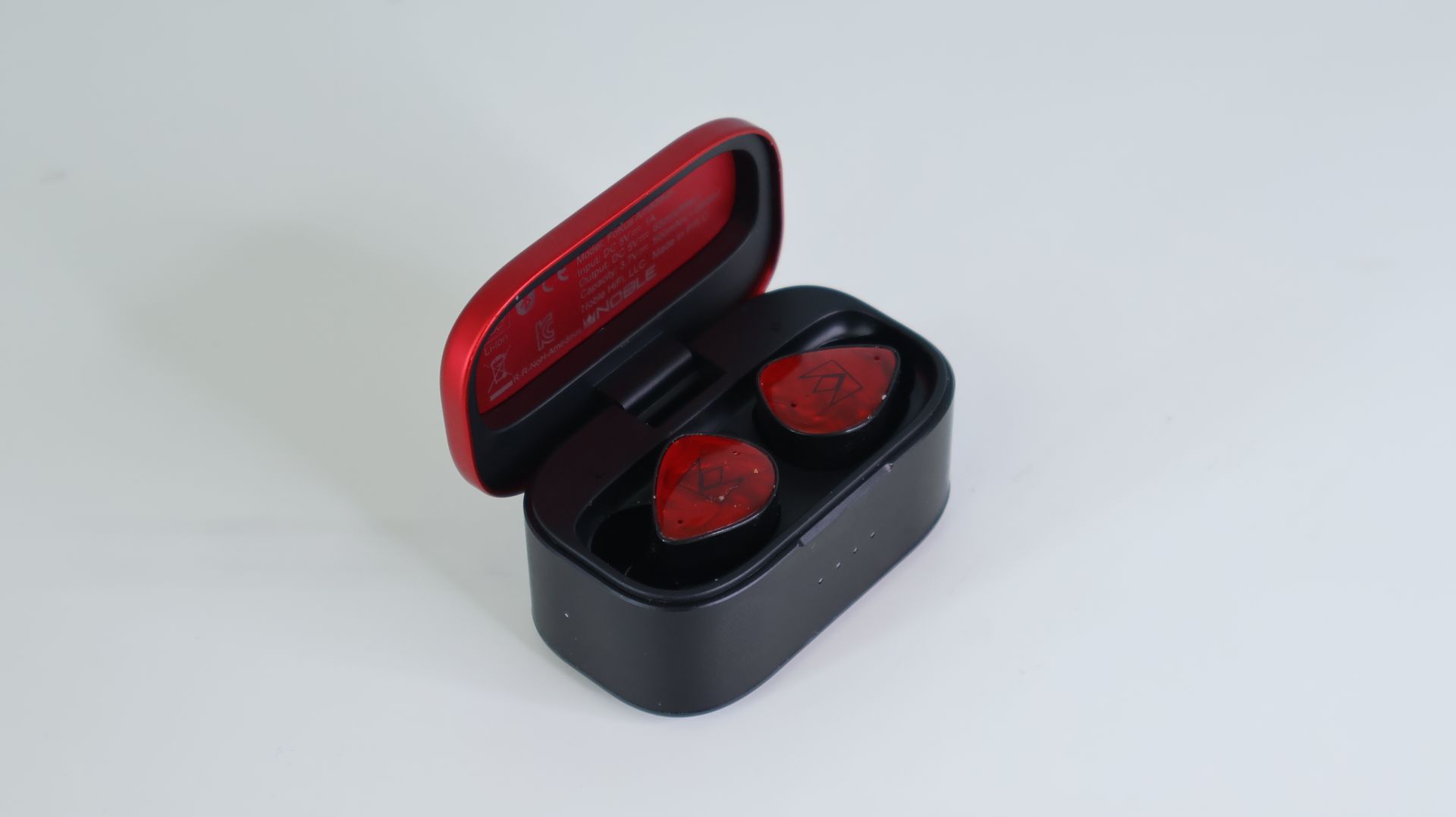 I've been testing these bright red earbuds, and they live up to their ...