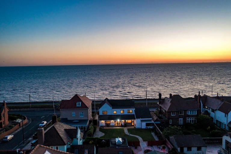 Stunning five-bedroom coastal home on Queens Promenade with panoramic ...