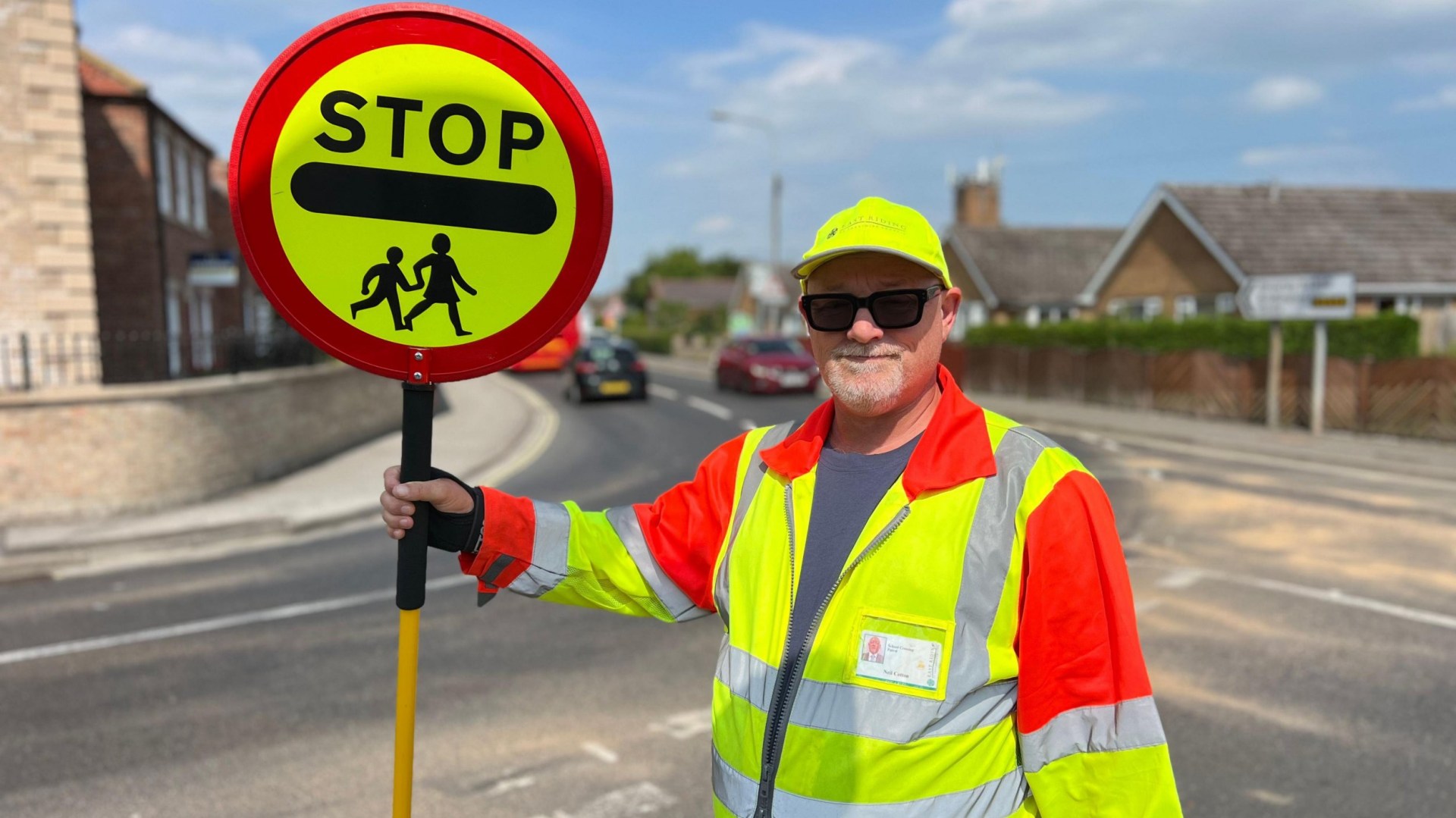 Lollipop man banned from high-fives over safety fears