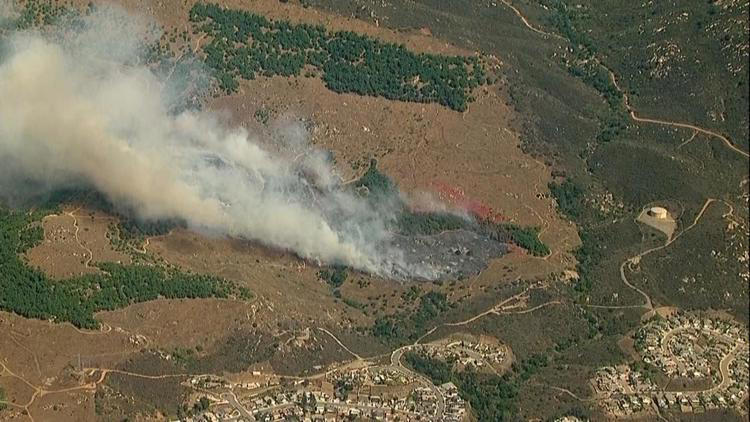 Hawick Fire | Fire crews stop forward spread of fire in East San Diego ...