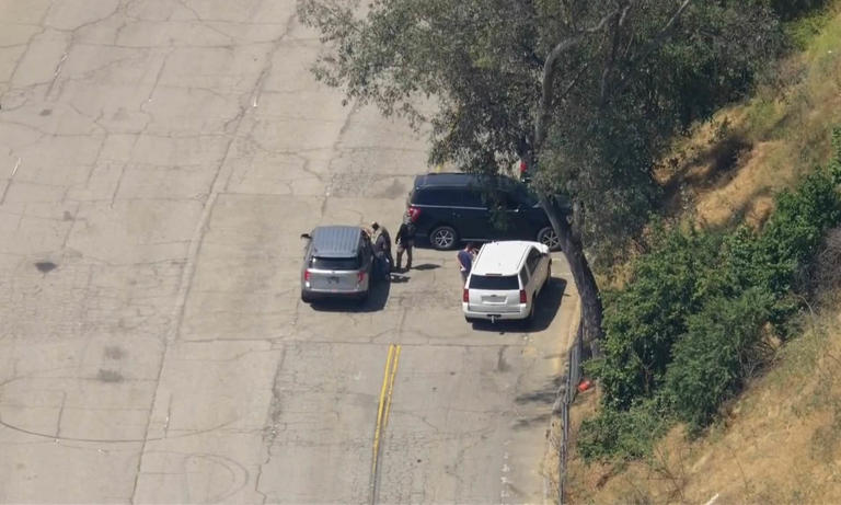 ICE agents descend on Dodger Stadium two weeks after riots that brought ...