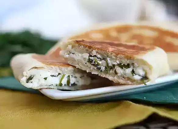 Stuffed Turkish crepes with feta, lemon, and parsley - gözleme