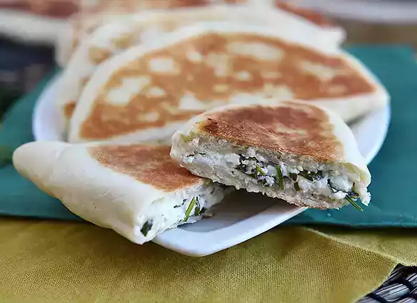 Stuffed Turkish crepes with feta, lemon, and parsley - gözleme