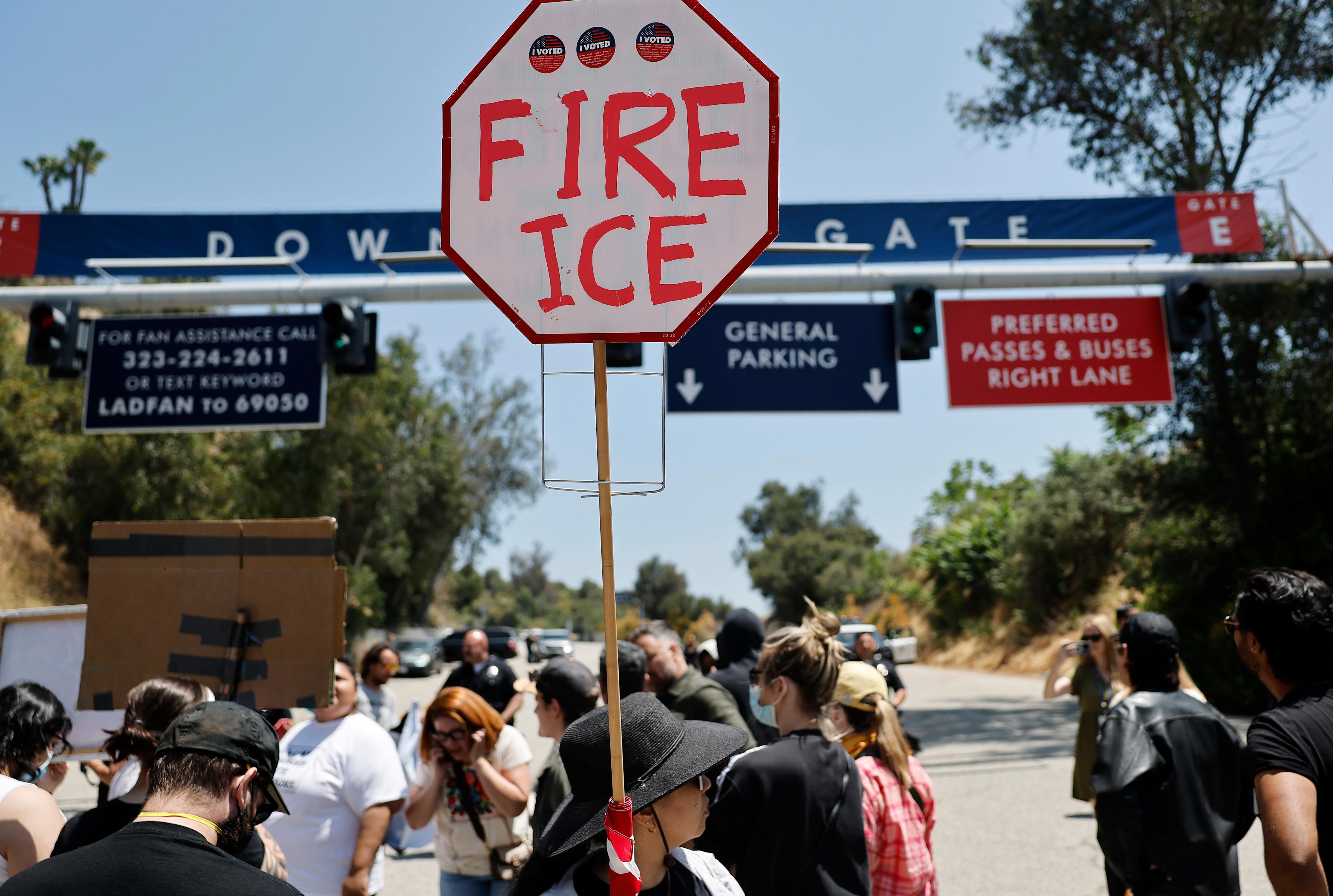 Protests at Dodger Stadium in images as ICE agents appear in parking ...