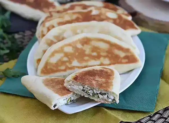 Stuffed Turkish crepes with feta, lemon, and parsley - gözleme