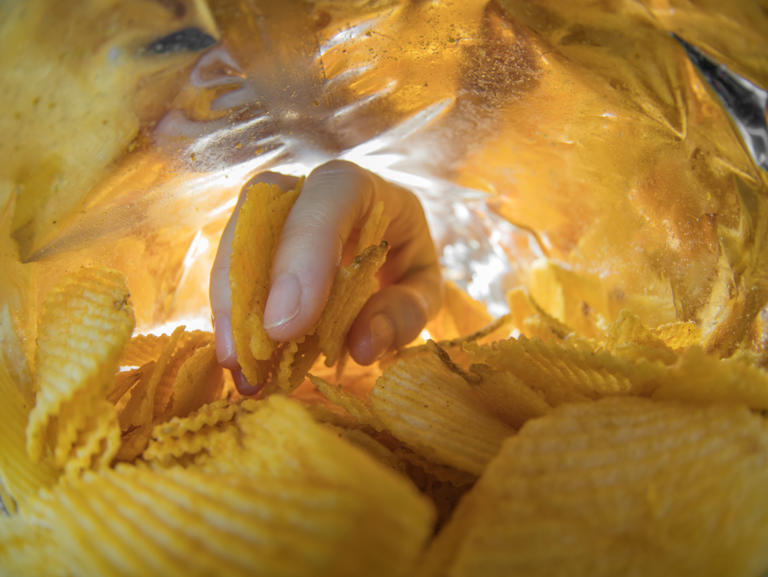 They Show Up in Every Bag – But Should You Eat the Green Chips?