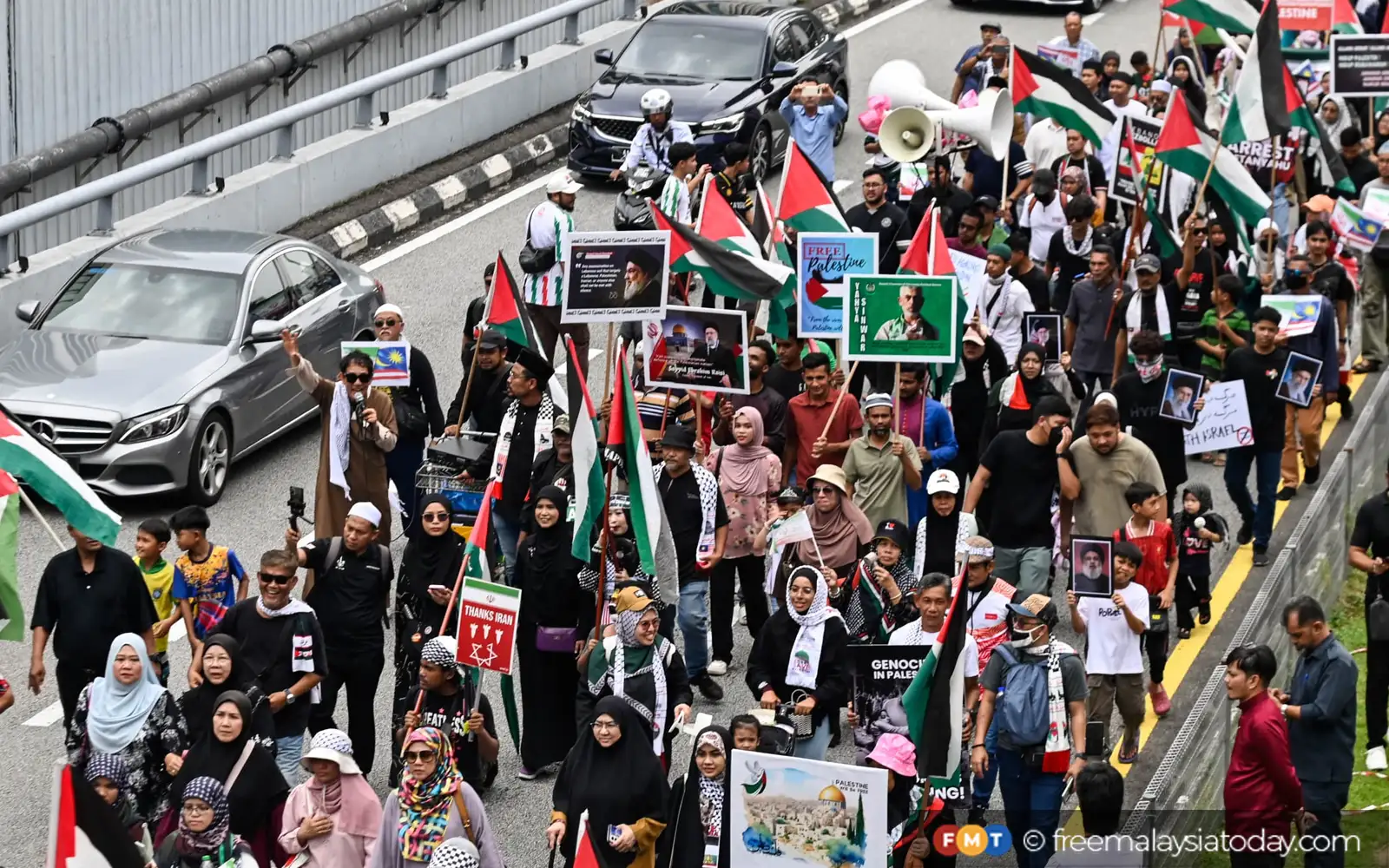 200 gather in front of US embassy to protest strikes against Iran