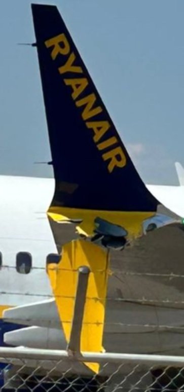 Ryanair plane damaged after a wing hit a fence during landing