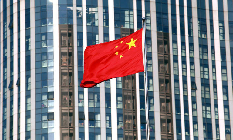 China says it expelled a Philippine gov't ship from disputed waters