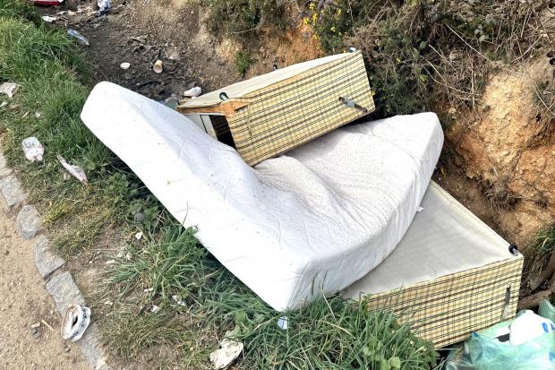 Fly-tipper caught on camera dumping bed at side of Bucks road fined £1,000