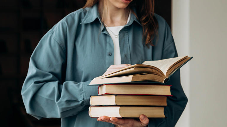 The Creative Way To Display Books That Looks Like They're Floating