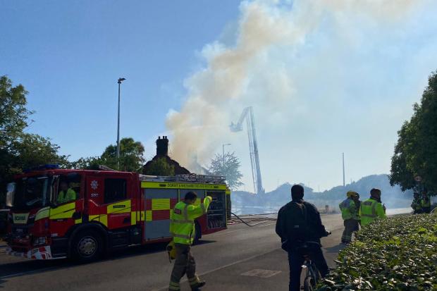 PICTURES: Fire crews battle fire by Sainsbury's as police close A420