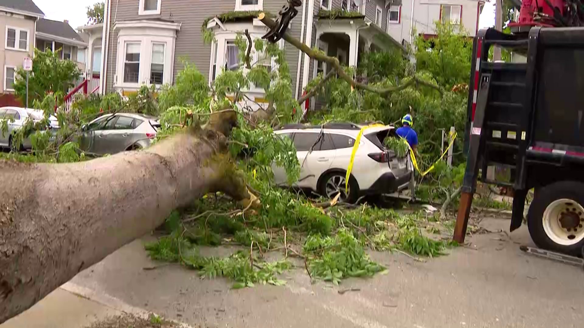 3-story tree crushes vehicle, part of home in Boston as winds kick up