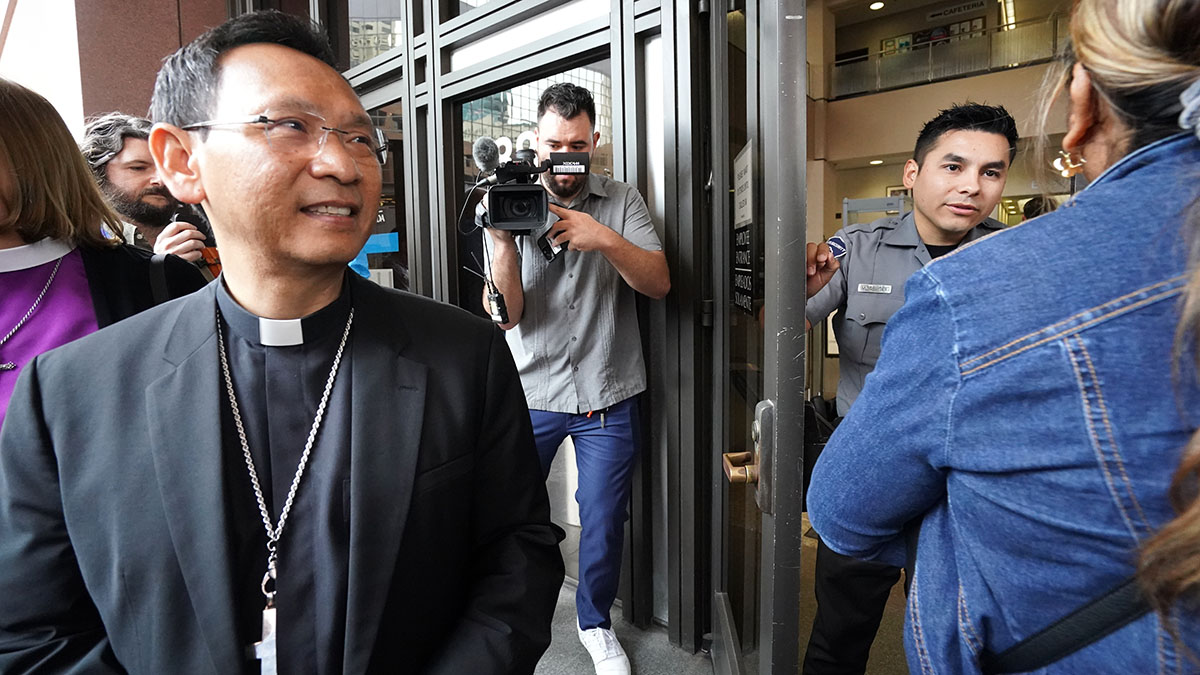 ICE agents scatter as SD Bishop Pham, other clergy visit immigration court
