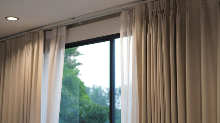 Why Heavy Drapery Is One Of The Worst Choices For Your Living Room