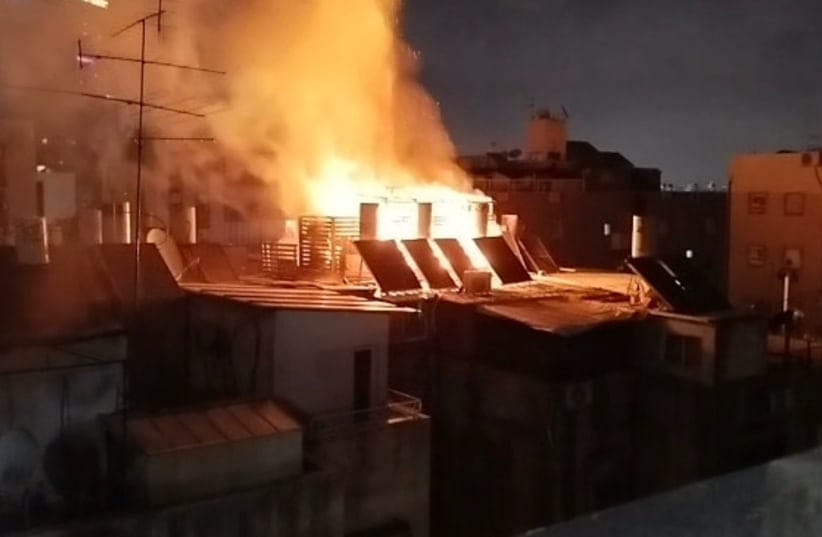 Shrapnel from Iranian missile causes fire in central Israel