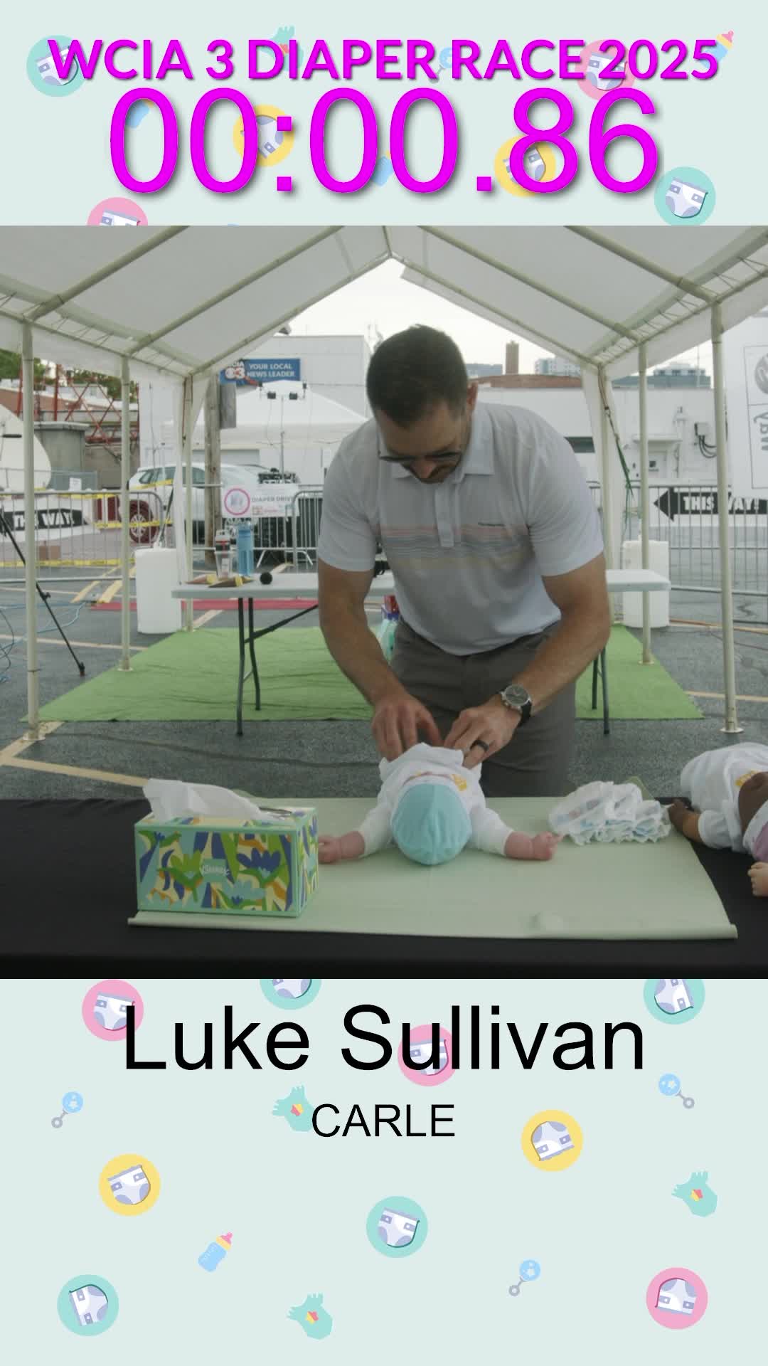 Luke Sullivan competes in diaper race
