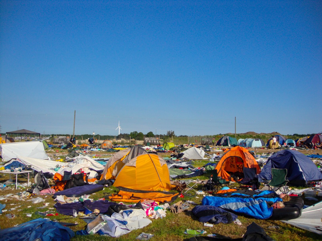While 130,000 Danes party at Roskilde Festival, an invisible workforce ...