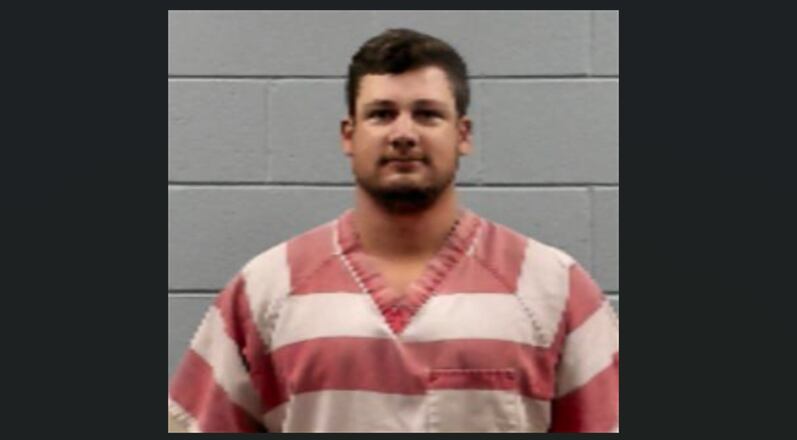 Former Pearl Police officer booked on grand larceny charge