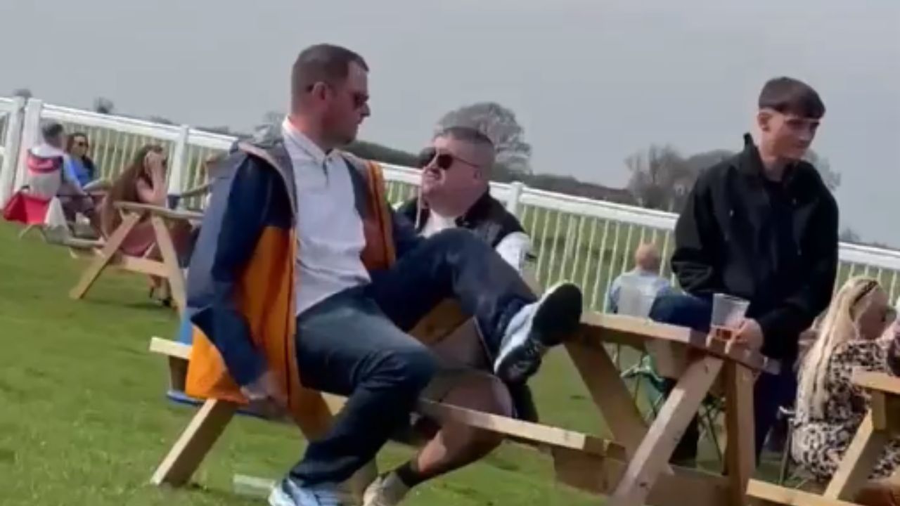 Mischievous man's prank shows unsuspecting friend falling over in a ...