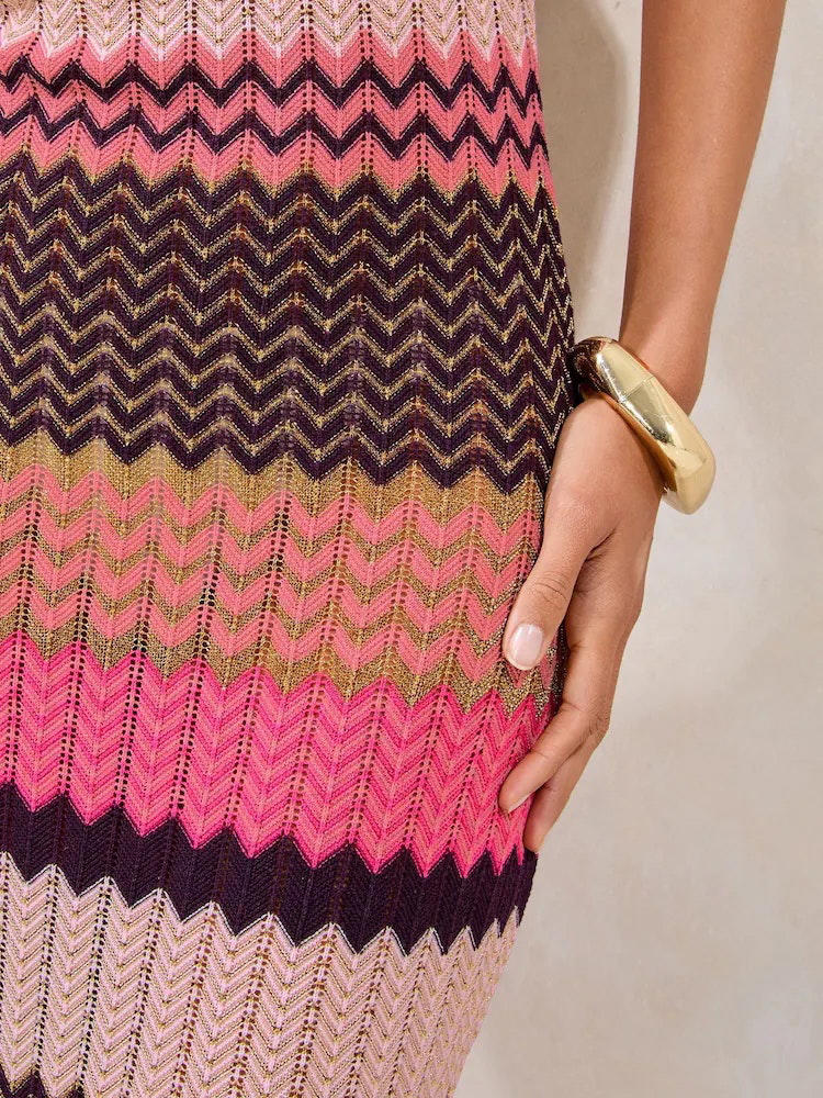 Crochet is everywhere this summer – and this dress has us swooning