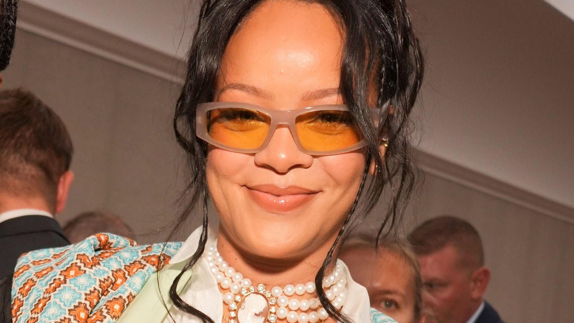 Rihanna rocks school-girl chic in rare public appearance with two-year ...