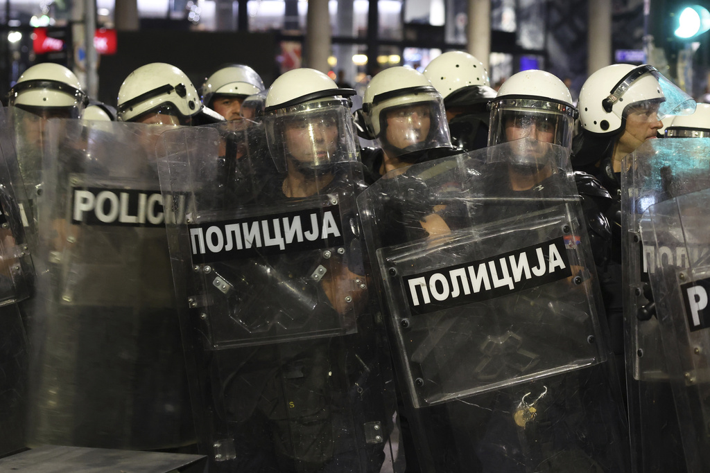 Dozens of anti-government protesters detained during clashes with riot ...