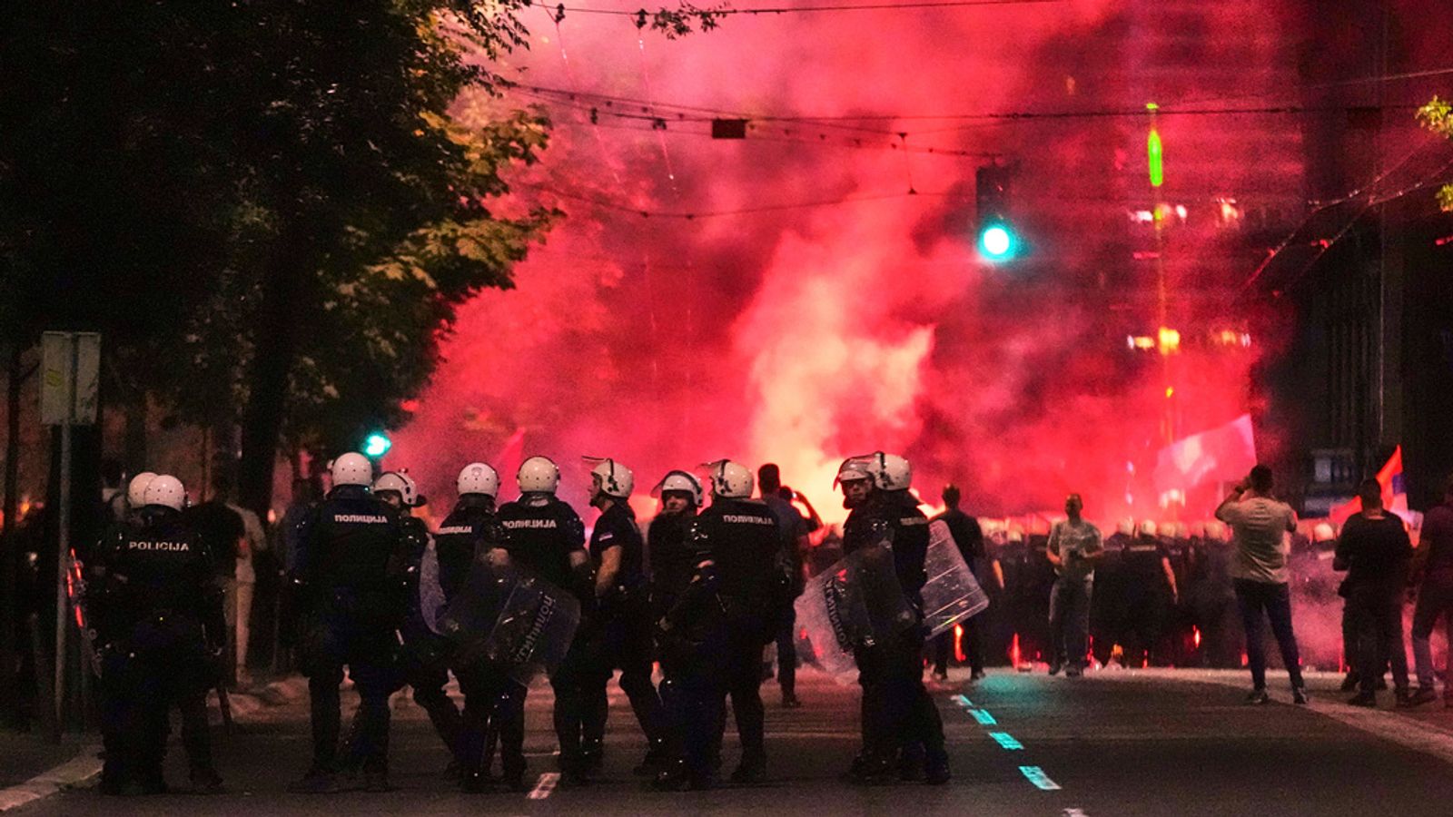 Riot police clash with protesters calling for end to Serbian president ...