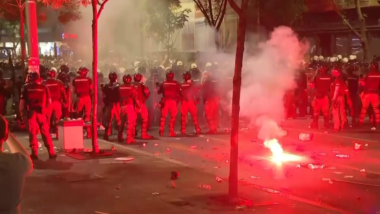 Protesters detained during clashes with riot police in Serbia