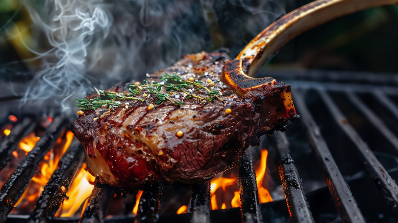 The Pros And Cons Of Cooking Steak On A Charcoal Vs Gas Grill
