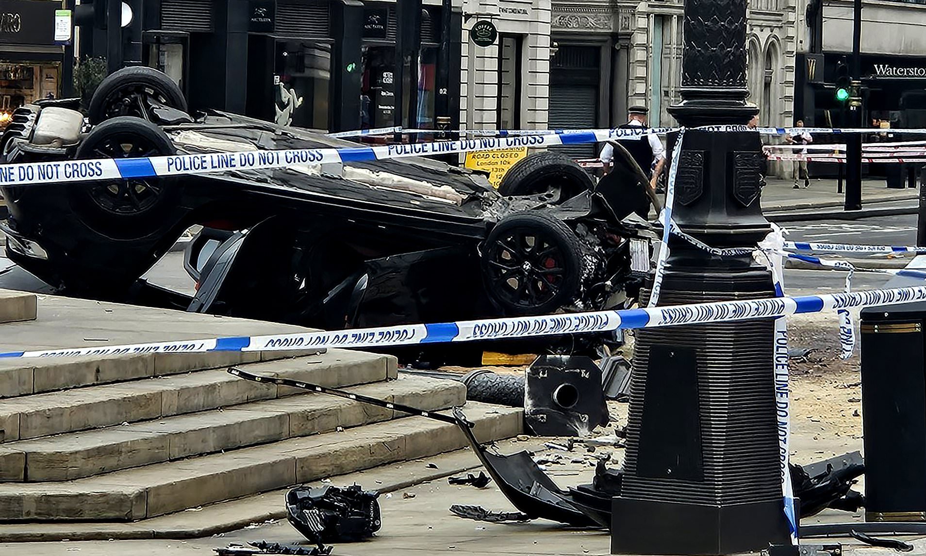 Car smashes into central London landmark, closing off streets as two ...