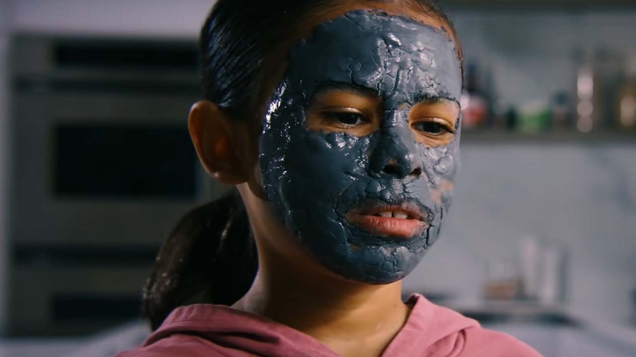 A Shy Girl Hides Behind a Mask at Theater Camp