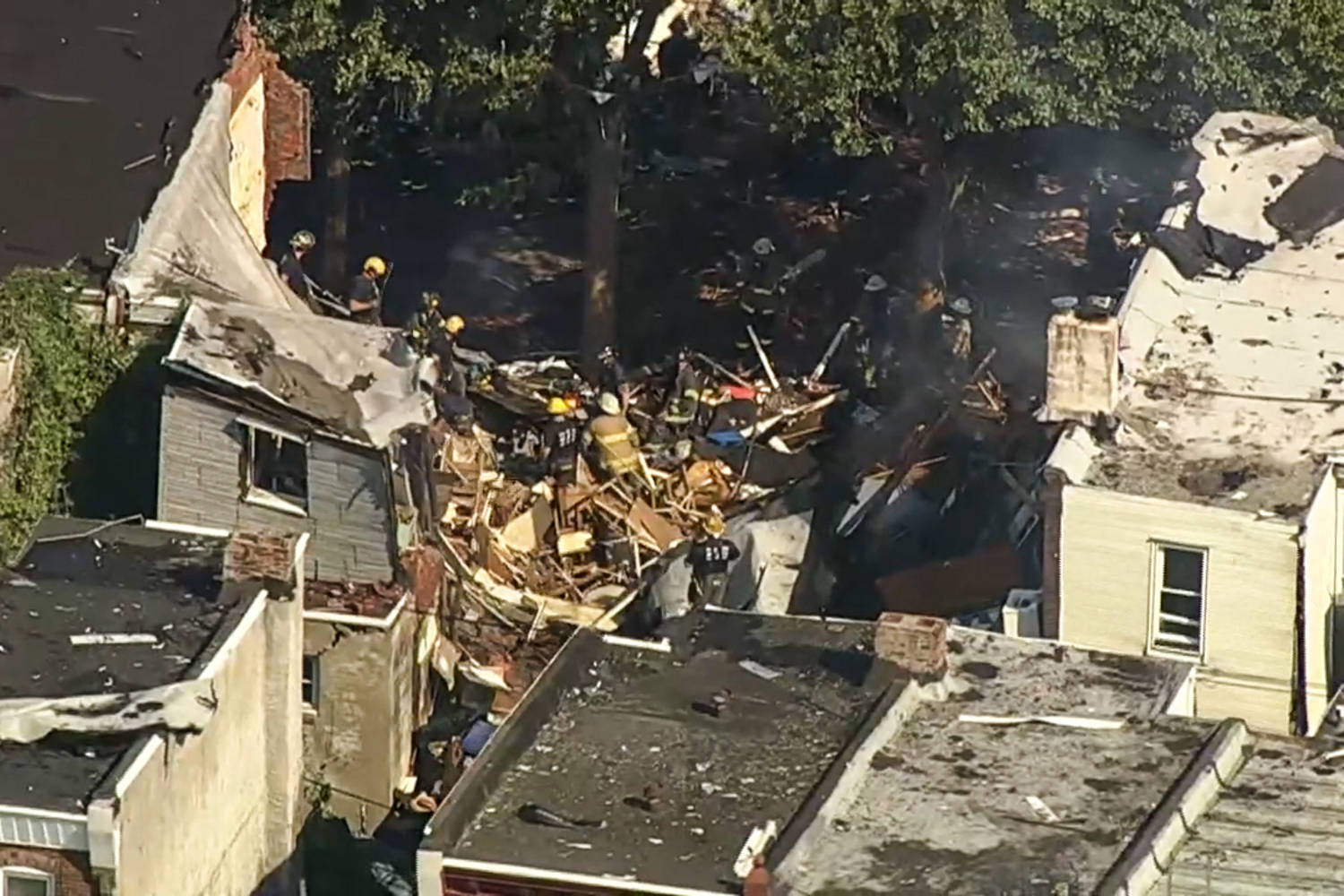 Two injured after three buildings collapse following explosion in ...