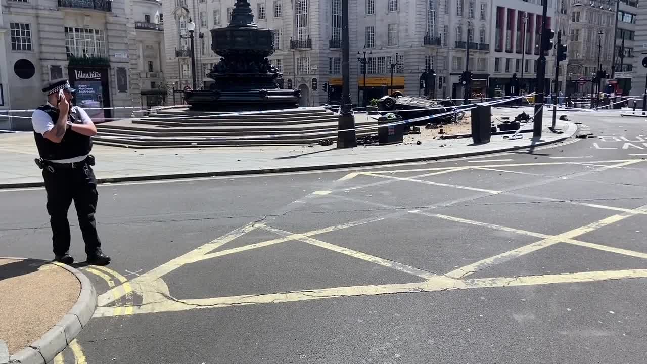 Piccadilly Circus in London closed off as forensics investigate a car crash