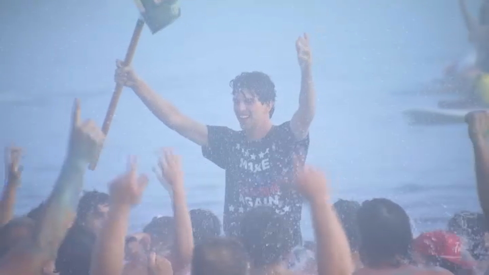 ‘A dream come true': Gloucester man wins annual greasy pole competition