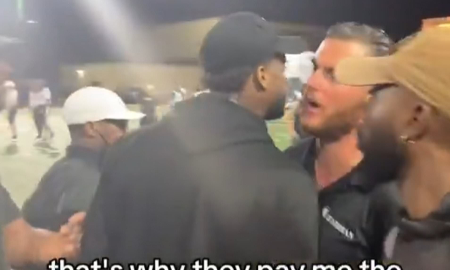 NFL quarterback held back by security after getting into fight while ...