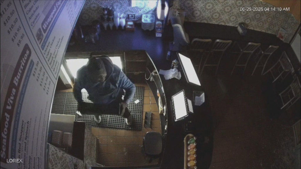 Surveillance Video Shows Burglar Break Into Boston Restaurant Smash