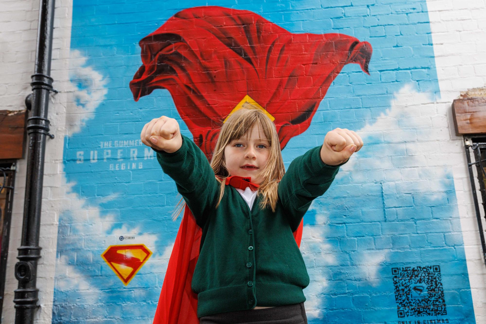 Superman's iconic cape sweeps through Glasgow in epic street art trail