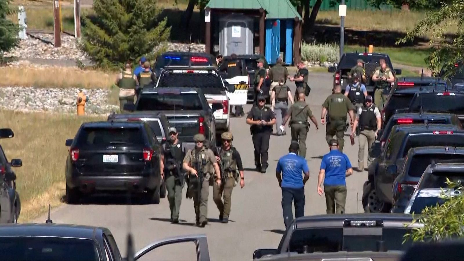 Two firefighters killed after asking man to move his car
