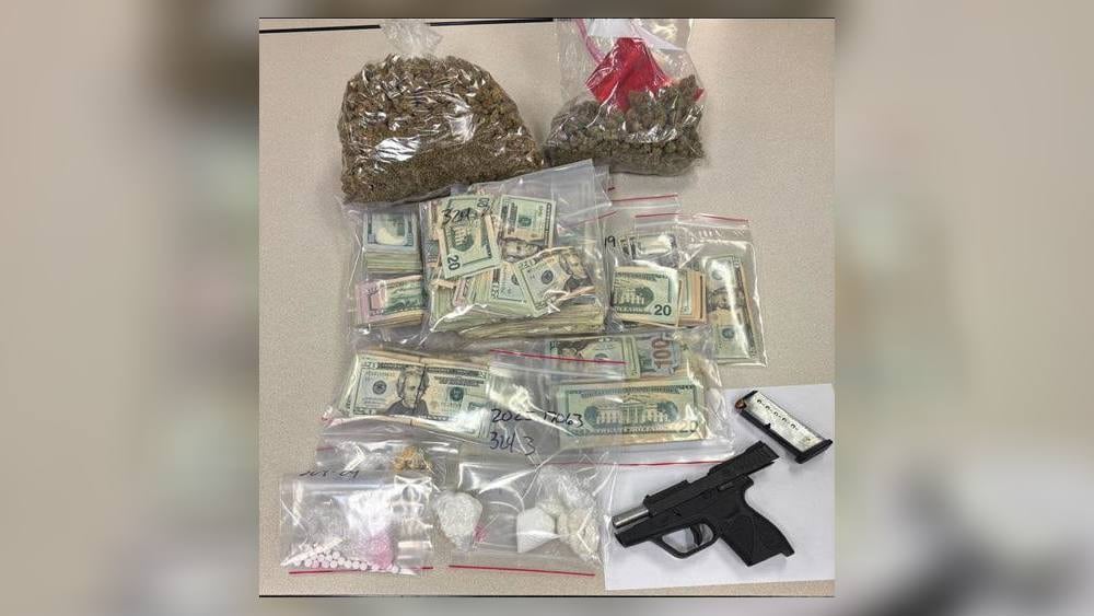 Police find almost 700 grams of drugs, a firearm, cash during search ...