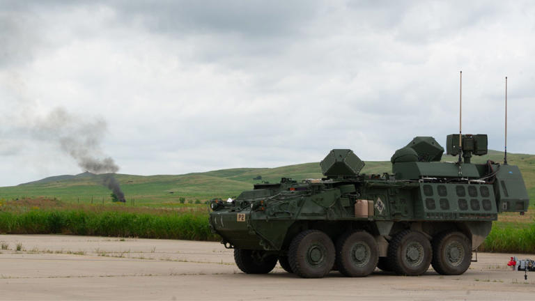 Laser tank goes live: US Army zaps drones 5 miles out with 50kW Stryker ...