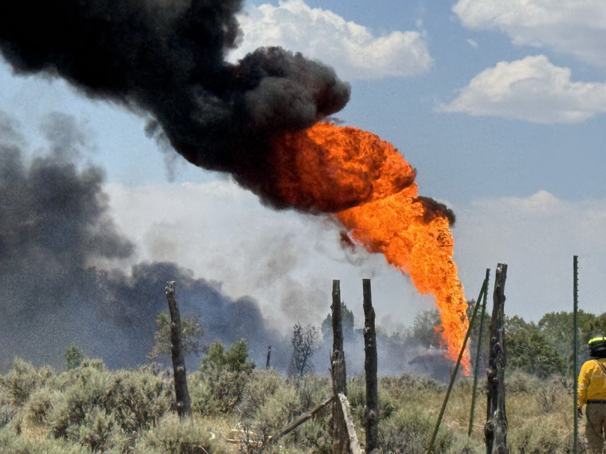Tesla Cybertruck hauling woodchipper sparks grass fire in southwest ...