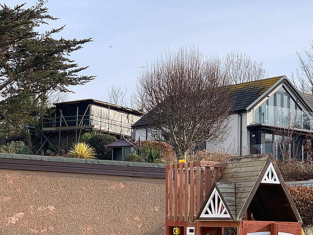 Airbnb owner ordered to tear down 40ft 'prison camp watchtower' from ...